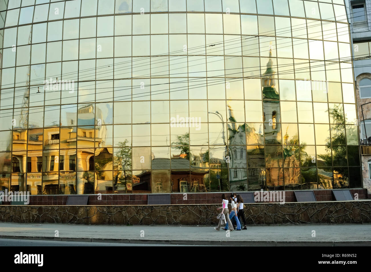 Reflections in windows of Tyumen State University Stock Photo - Alamy