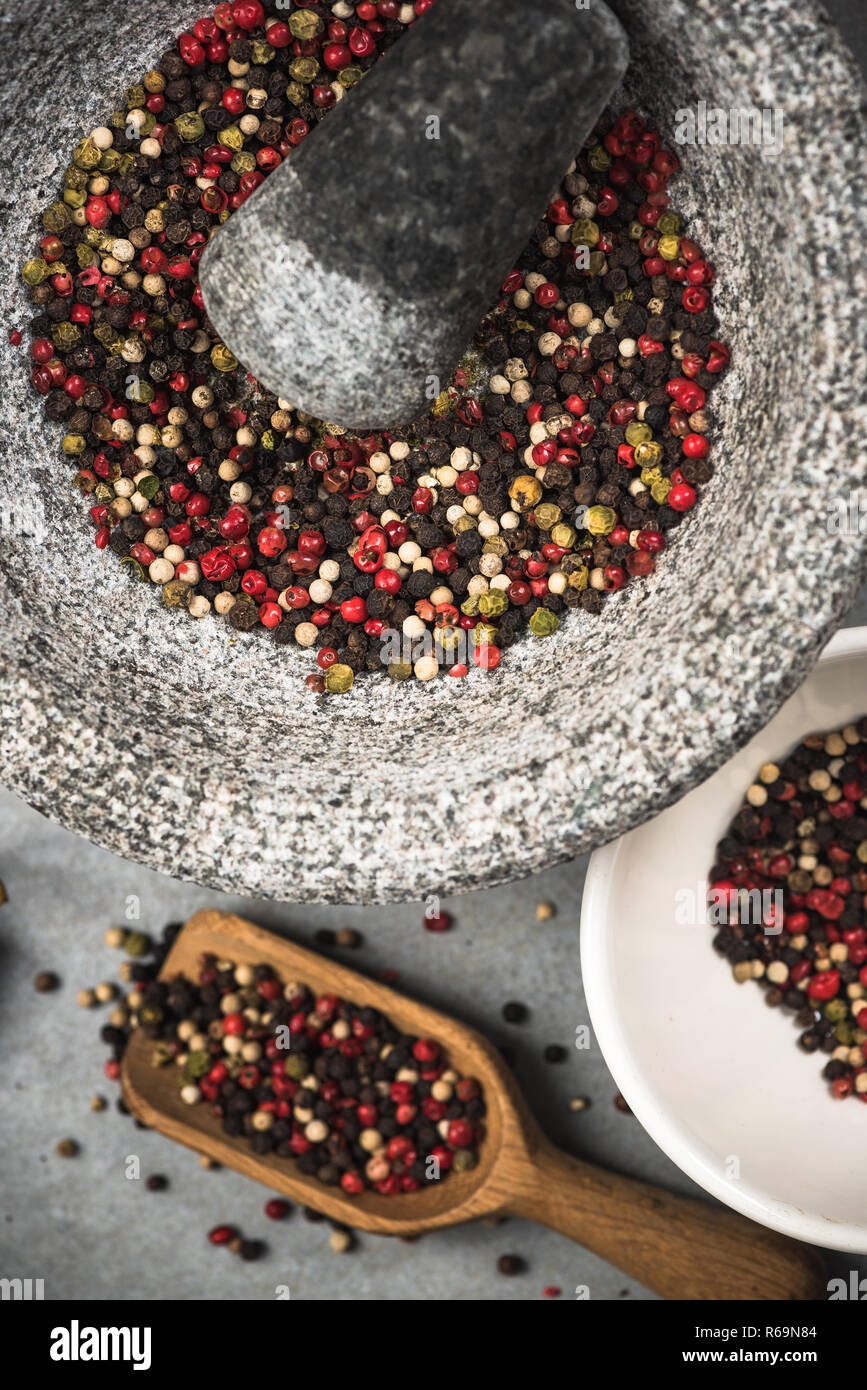 Peppercorn seed in granite mortar or pestle Stock Photo - Alamy