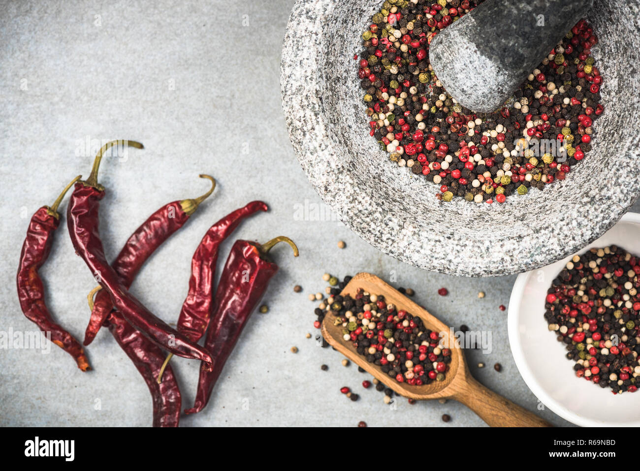 Peppercorn seed in granite mortar or pestle Stock Photo - Alamy