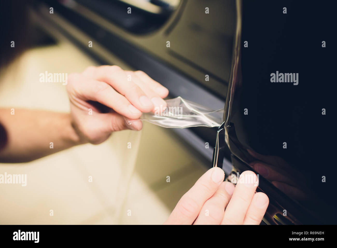 Car wrapper hands installs hi-res stock photography and images - Alamy