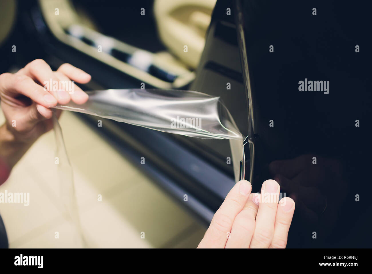 Car wrapper hands installs hi-res stock photography and images - Alamy