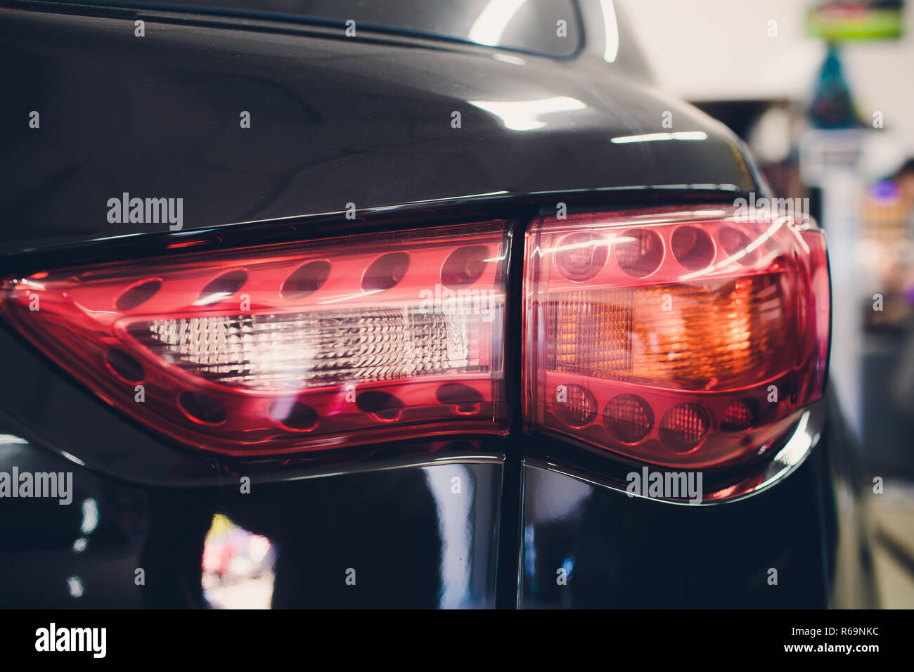 Taillight or rear light modern car in showroom Stock Photo - Alamy