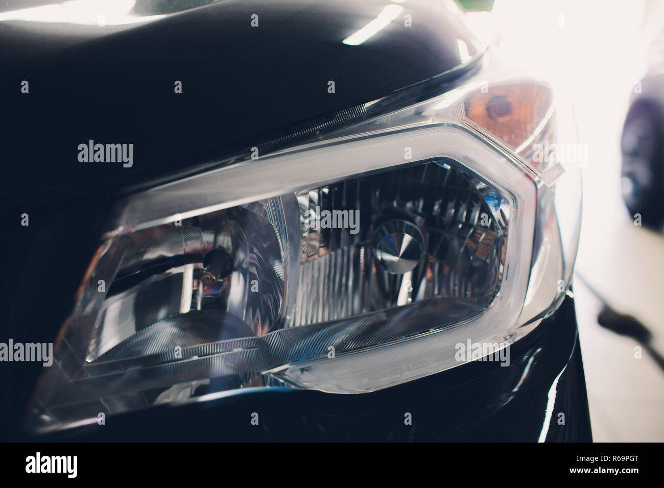 front headlight, with shiny reflections auto black body Stock Photo - Alamy
