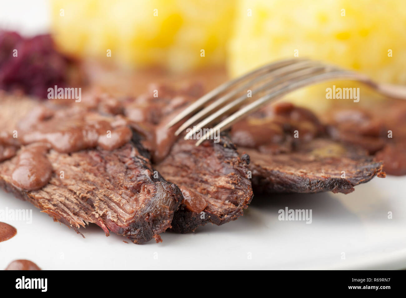 Closeup of a german sauerbraten with dumplings hi-res stock photography ...
