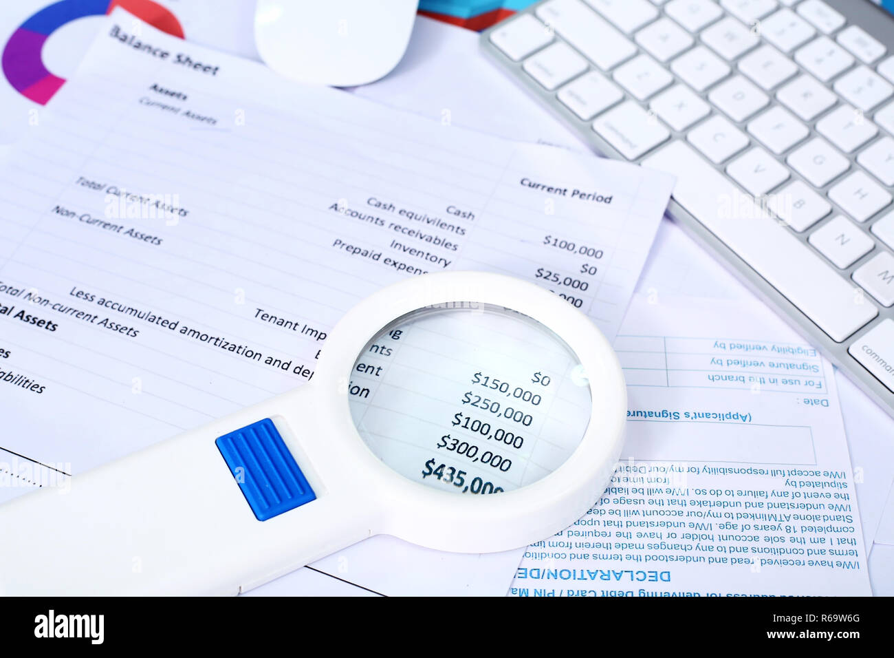 Portrait of account sheet,magnifying glass, keyboard and mouse Stock ...
