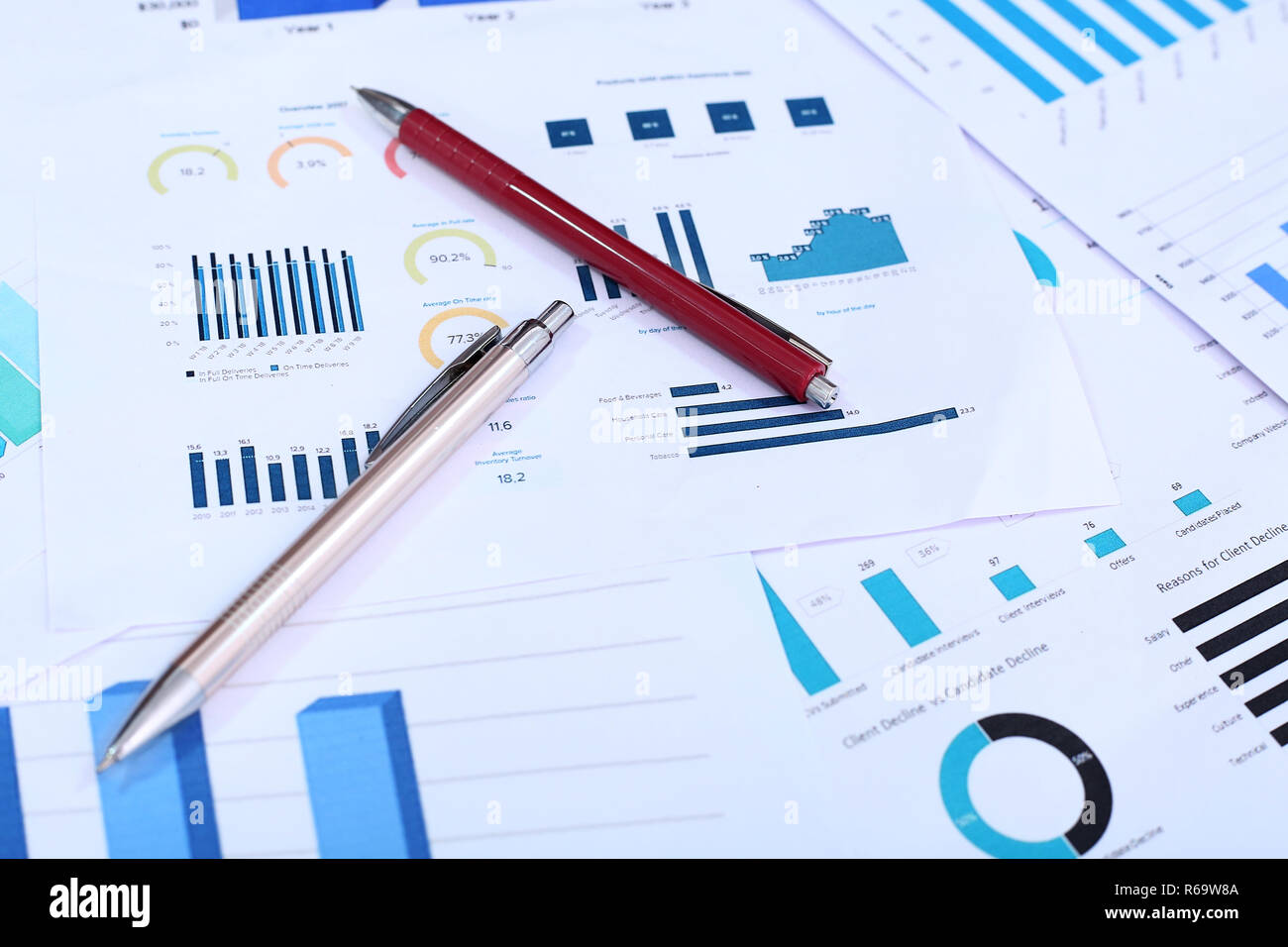 Portrait of two pen on the bar graph paper Stock Photo - Alamy