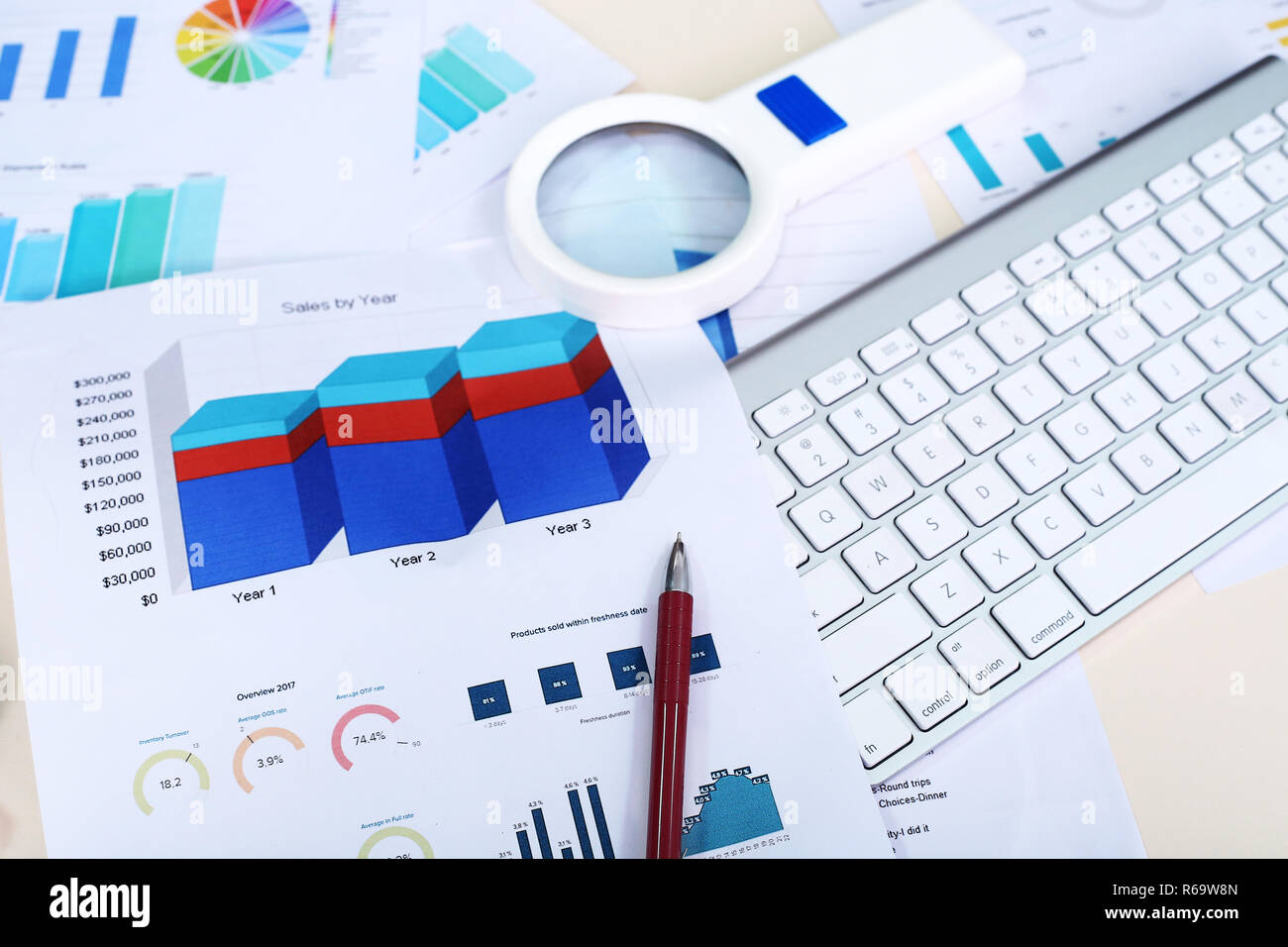 Picture of graph paper, pen, magnifying glass and keyboard Stock Photo ...
