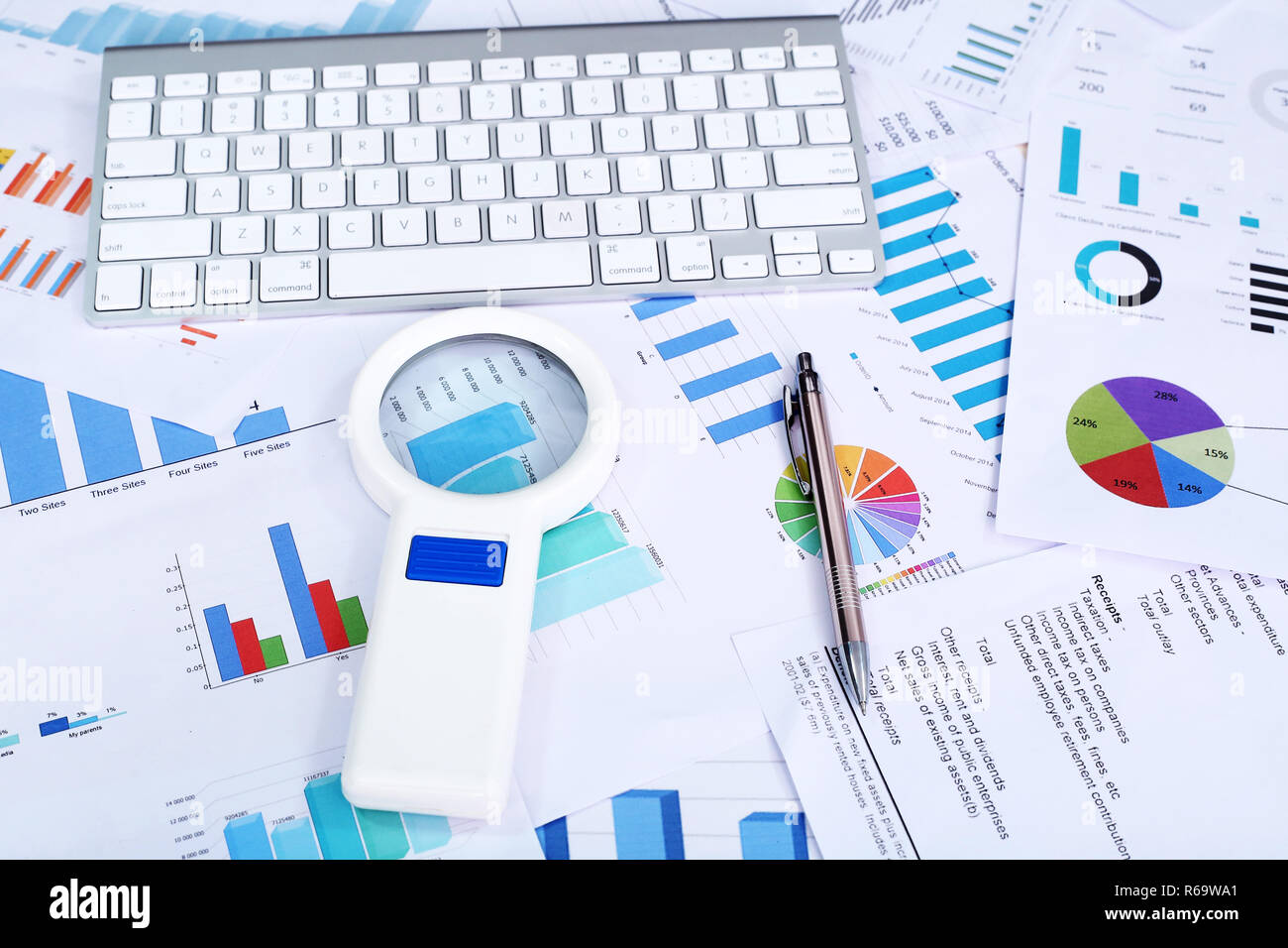 Portrait of graph paper, pen, magnifying glass and keyboard Stock Photo ...