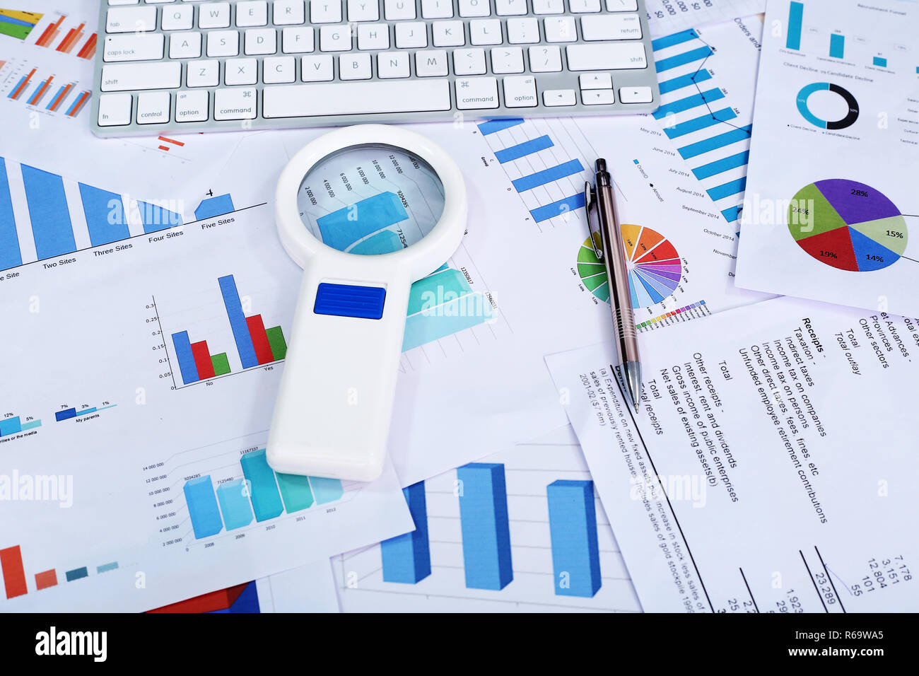 Picture of graph paper, pen, magnifying glass and keyboard Stock Photo ...