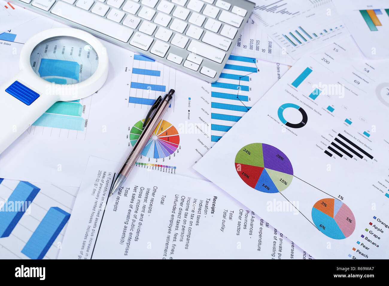 Photo of graph paper, pen, magnifying glass and keyboard Stock Photo ...