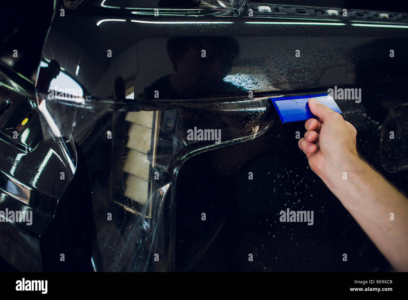 Car wrapper hands installs hi-res stock photography and images - Alamy