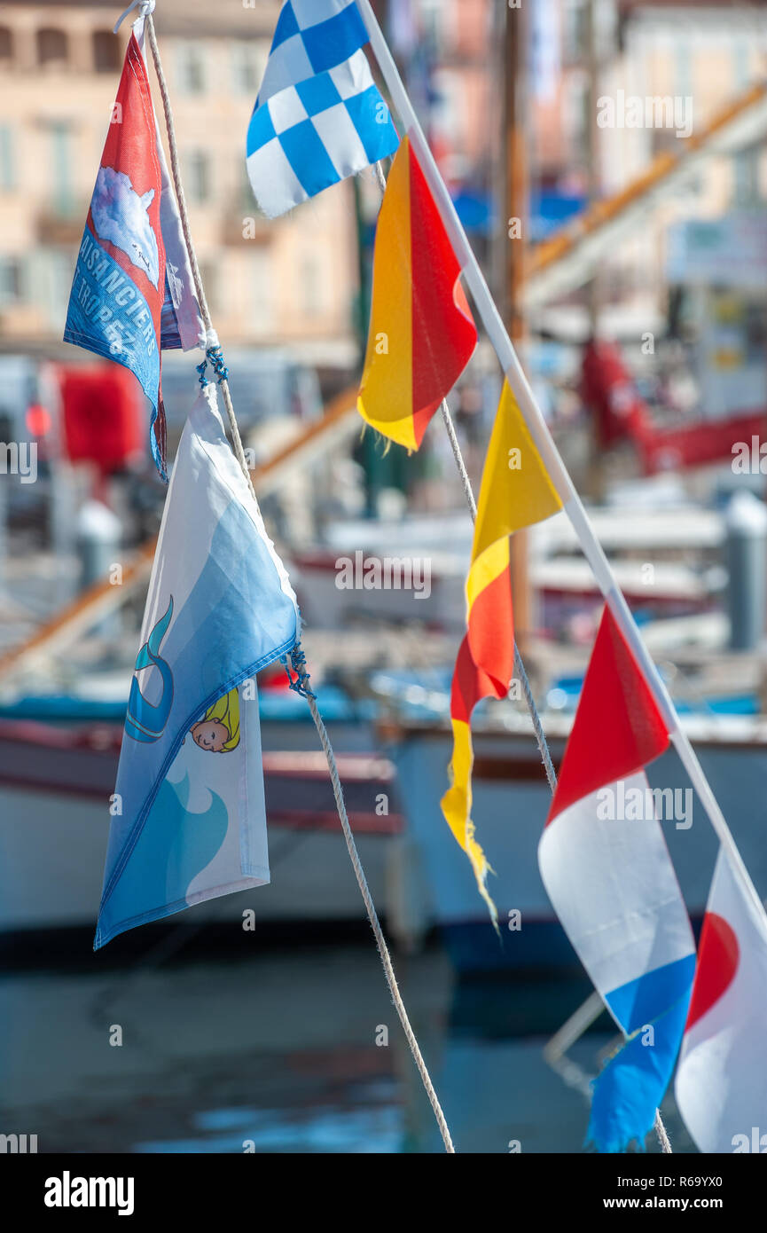 Flags in the fishing harbor, Saint-Tropez, Var, Provence-Alpes-Cote d ...