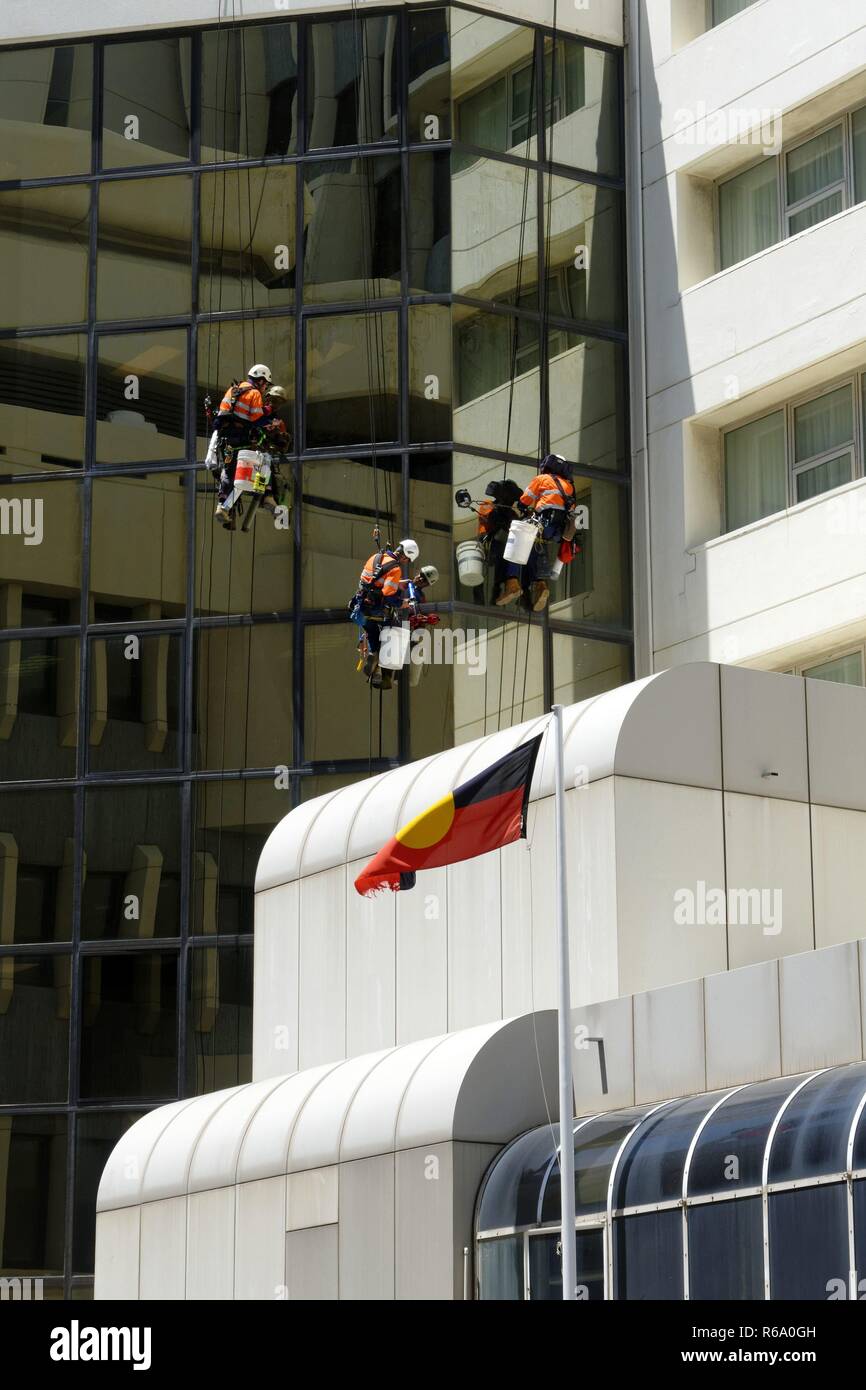 Riggers maintaining windows on high rise building, Perth, Western ...