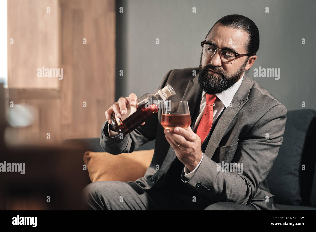 Man suffering from nervous breakdown continuing drinking whisky Stock ...