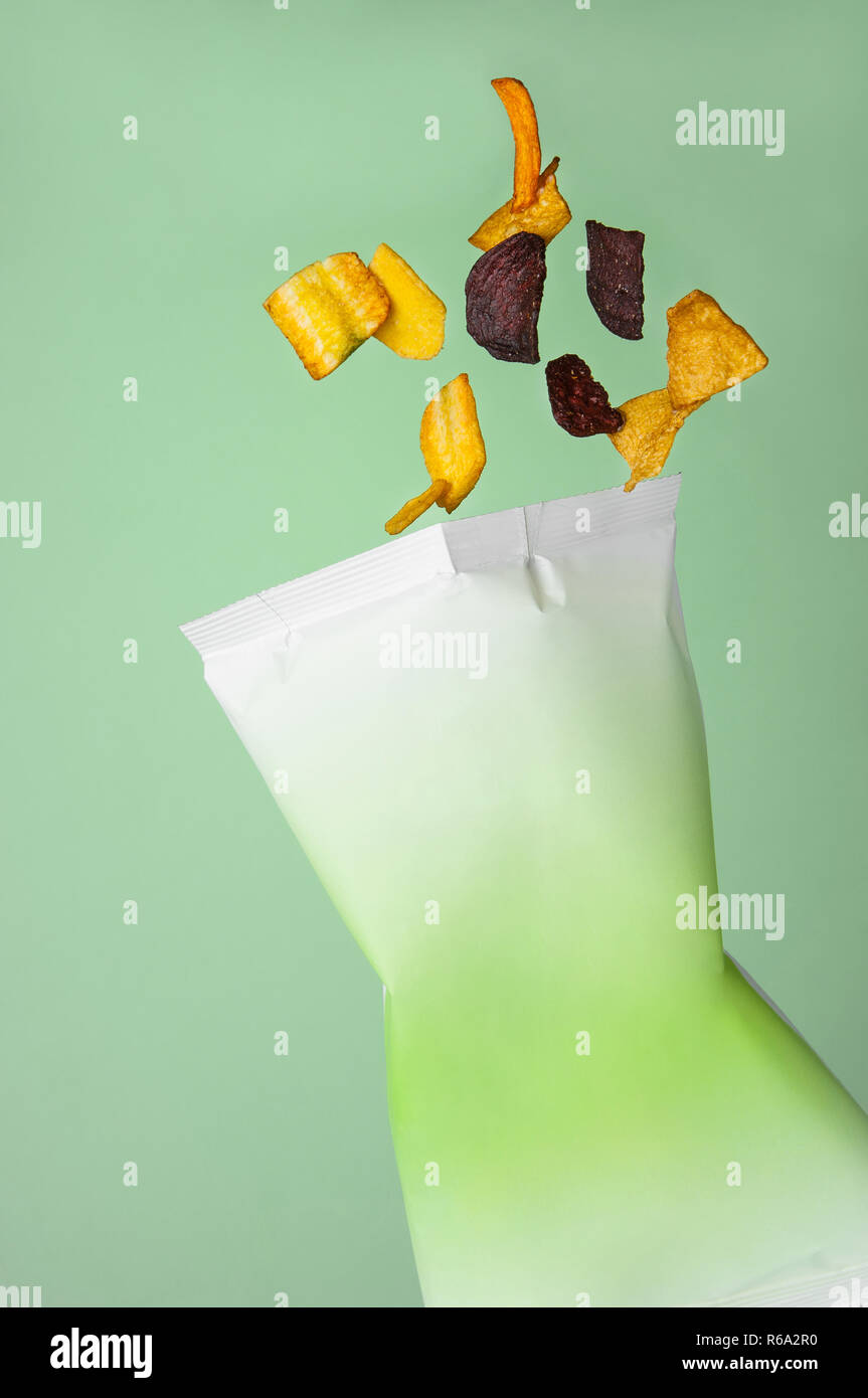 potato chips fall in a bag, float in the air, mid-air Stock Photo - Alamy