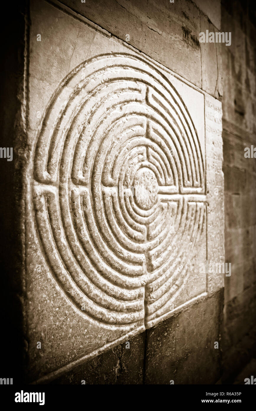 Labyrinth carved on the facade of a Romanesque church of the 11th ...