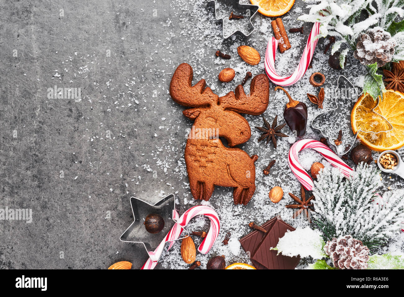 Holiday baking background. Baking Christmas gingerbread cookies with ...