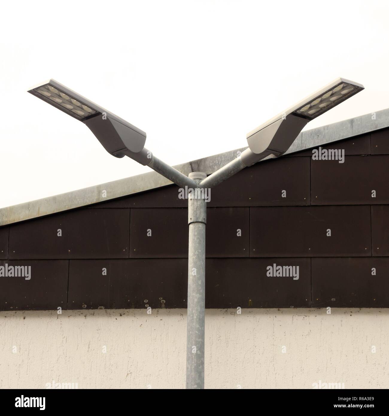 Street Lamp In Front Of A Building Stock Photo - Alamy