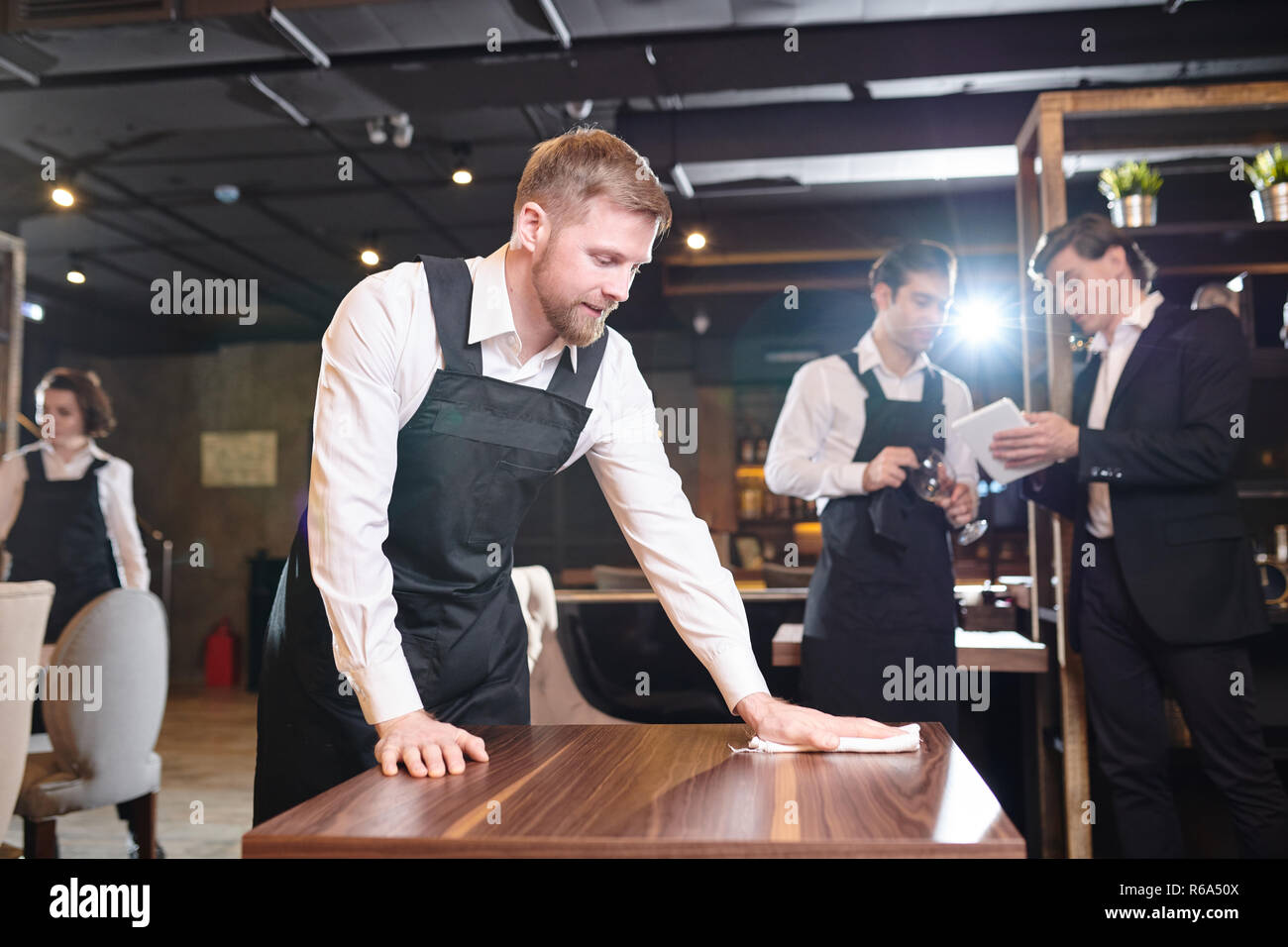 Wiping table hi-res stock photography and images - Alamy