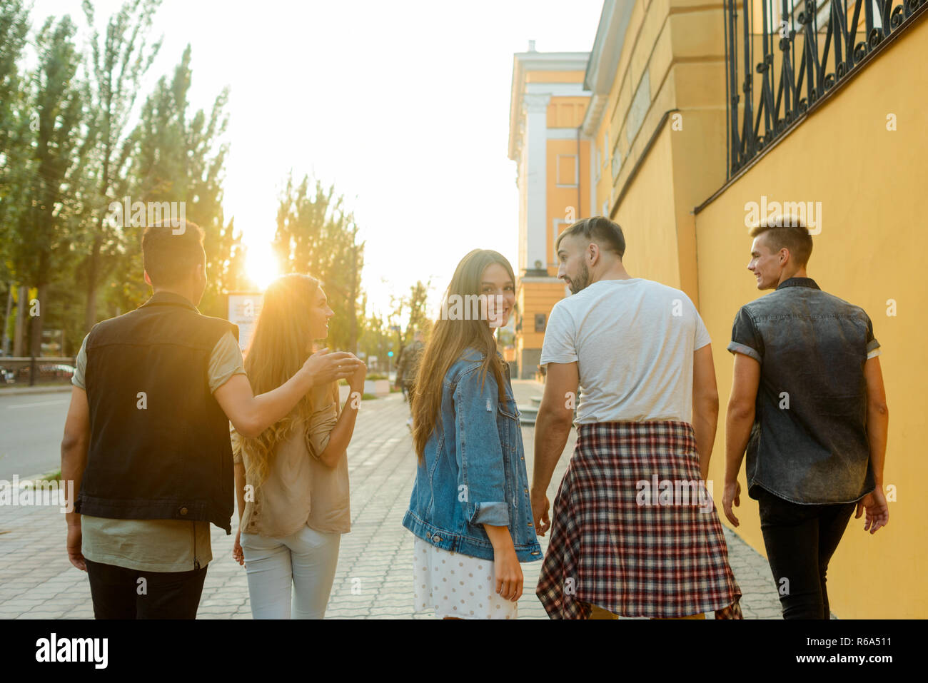 Guys walking in the city Stock Photo - Alamy