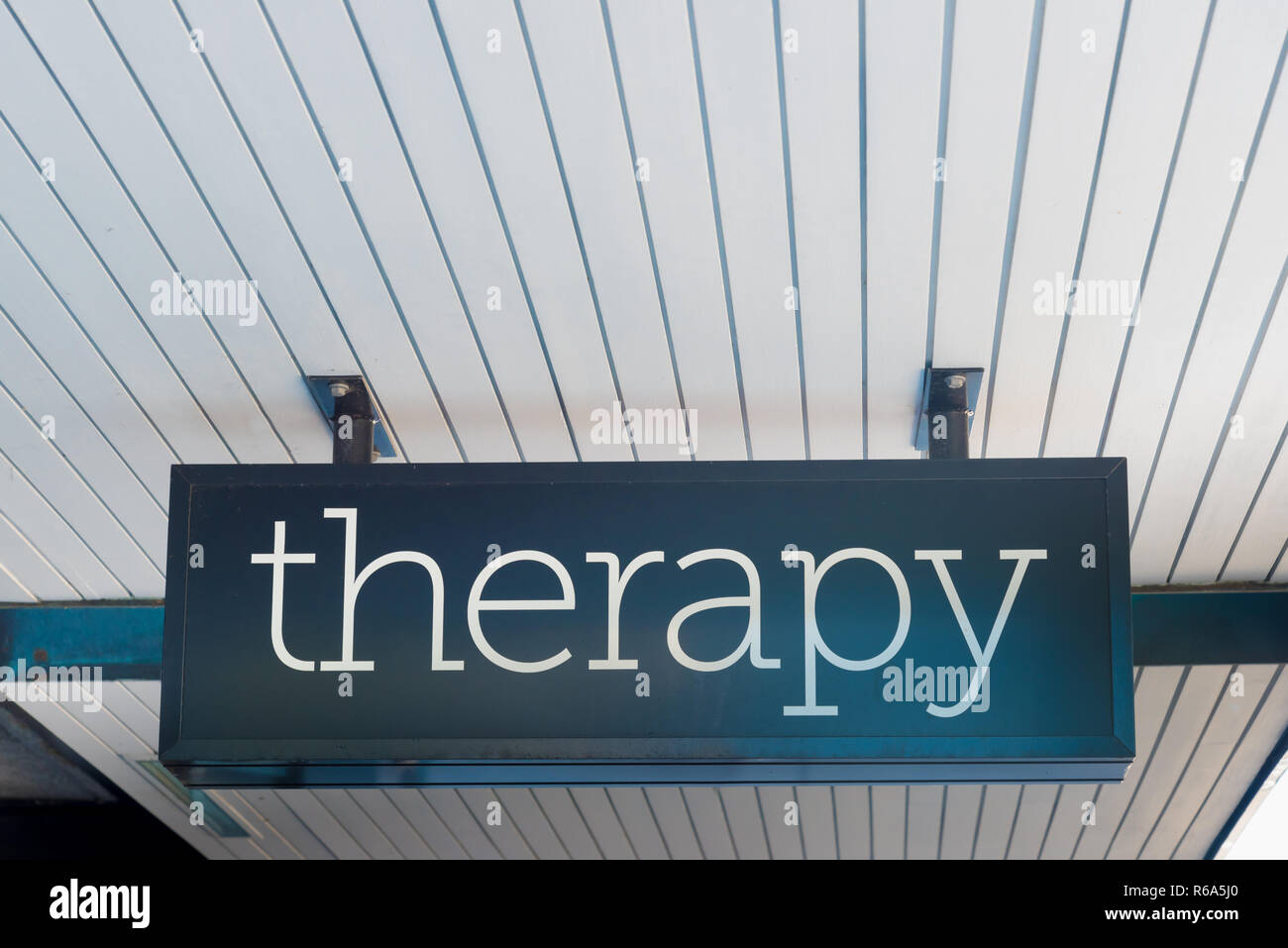 Banner sign with Therapy advertisement Stock Photo - Alamy