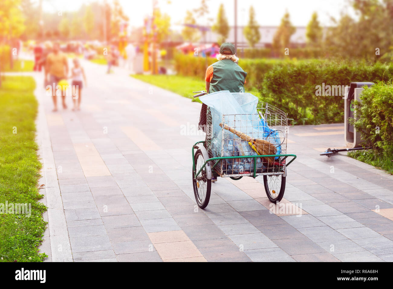 Cleaner sweeping uniform urban hi-res stock photography and images - Alamy