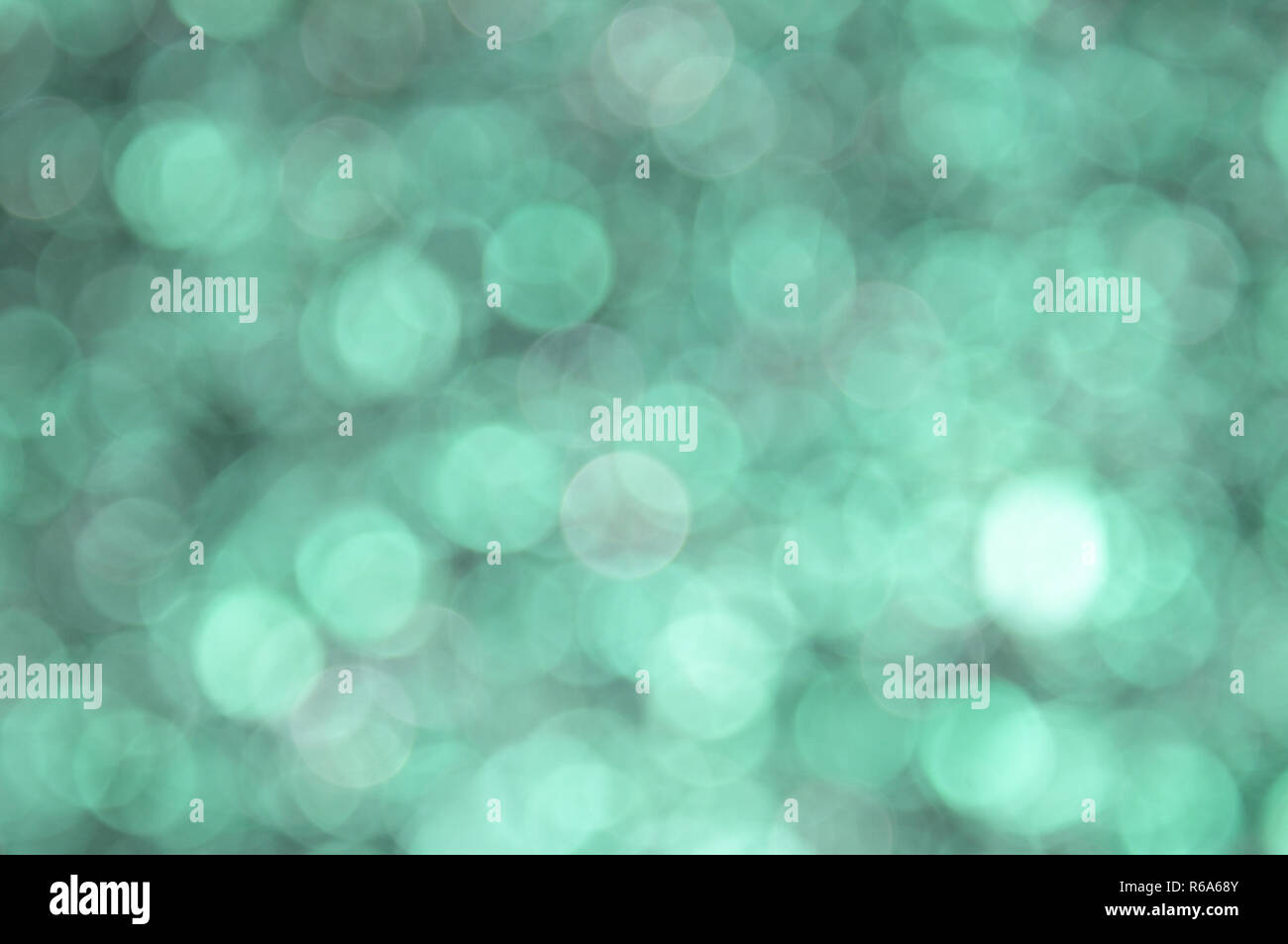 Turquoise colored abstract background with bokeh, for the new year and ...