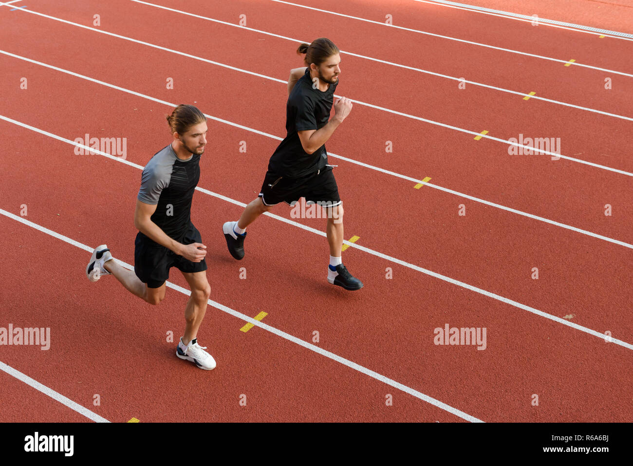 Male twins run hi-res stock photography and images - Alamy