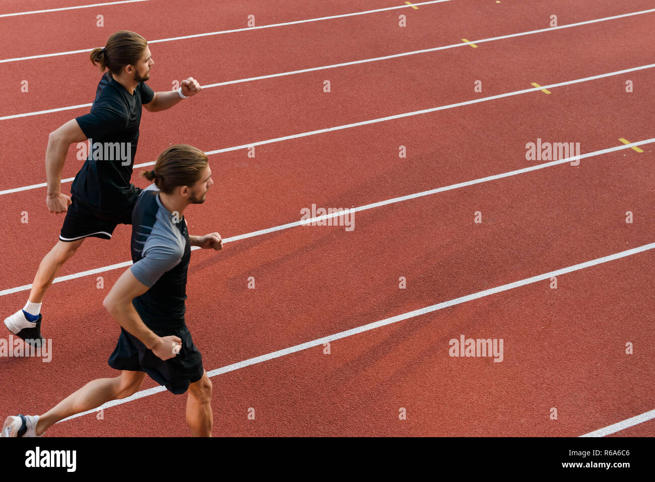 Two young brothers running hi-res stock photography and images - Alamy