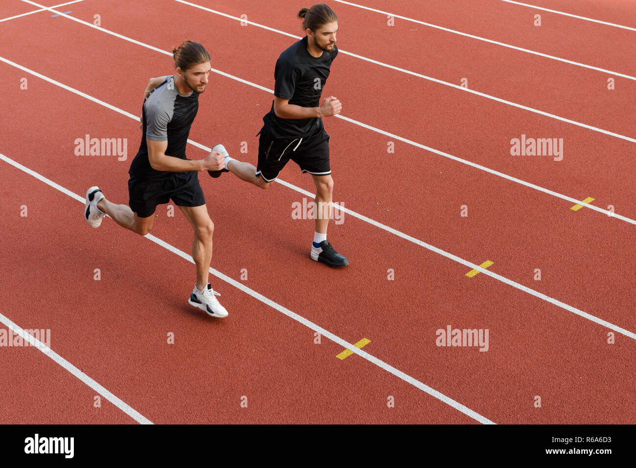 Male twins run hi-res stock photography and images - Alamy