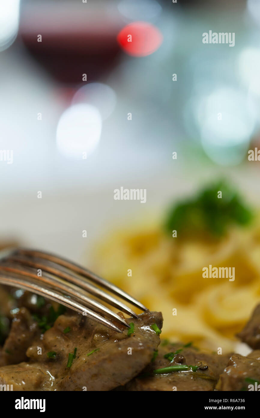 Fork On Meat Stock Photo - Alamy