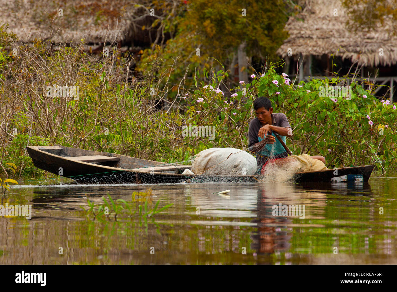 Peruvian Amazon fisherman Stock Photo - Alamy