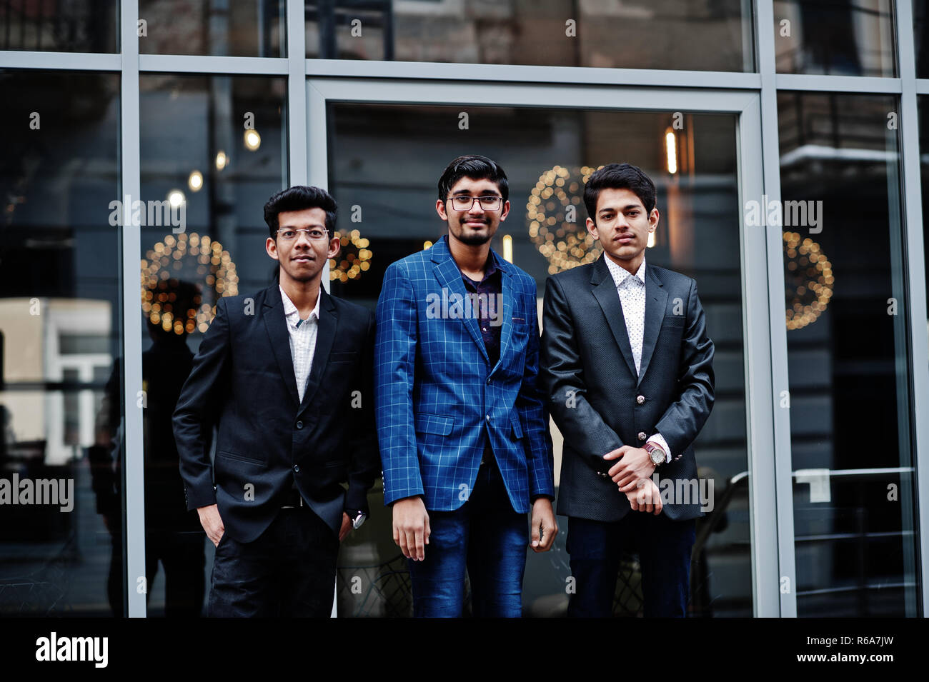 Three students in suits hi-res stock photography and images - Alamy