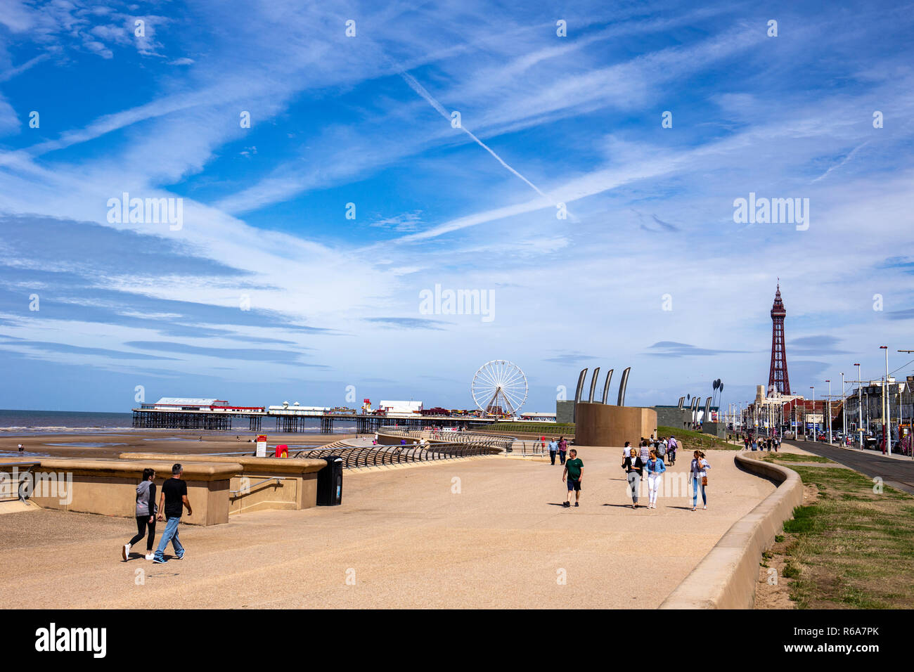 Beach, promenade, central pier with ferris wheel and tower in Blackpool ...