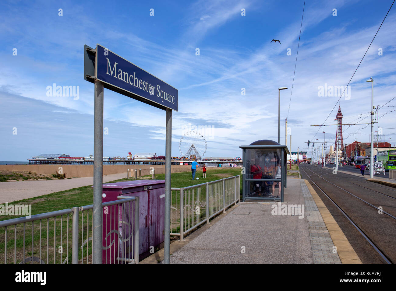 Manchester Square street sign with Central pier and Blackpool tower in ...