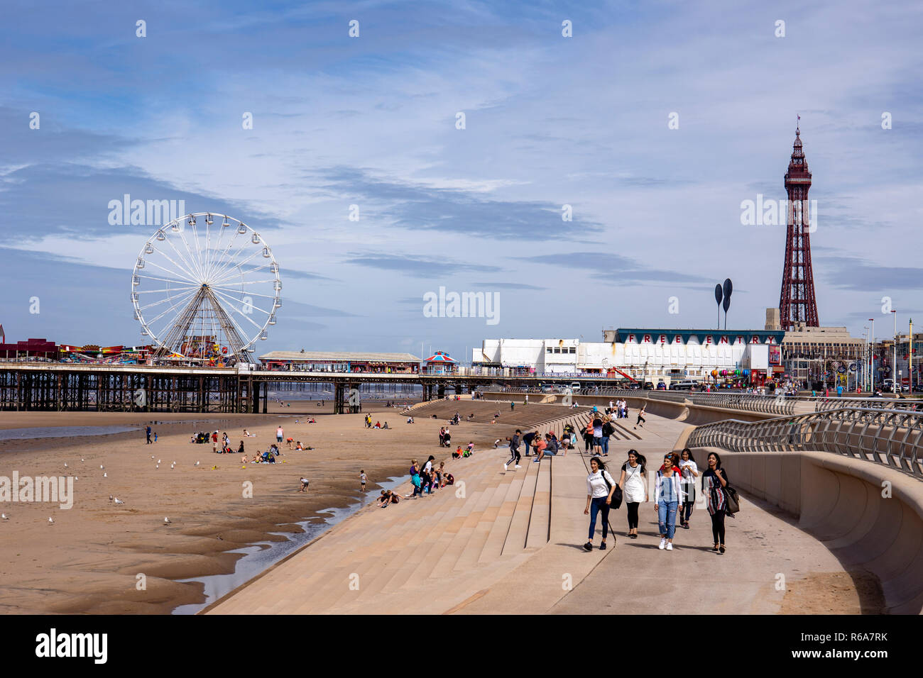Beach, promenade, central pier with ferris wheel and tower in Blackpool ...