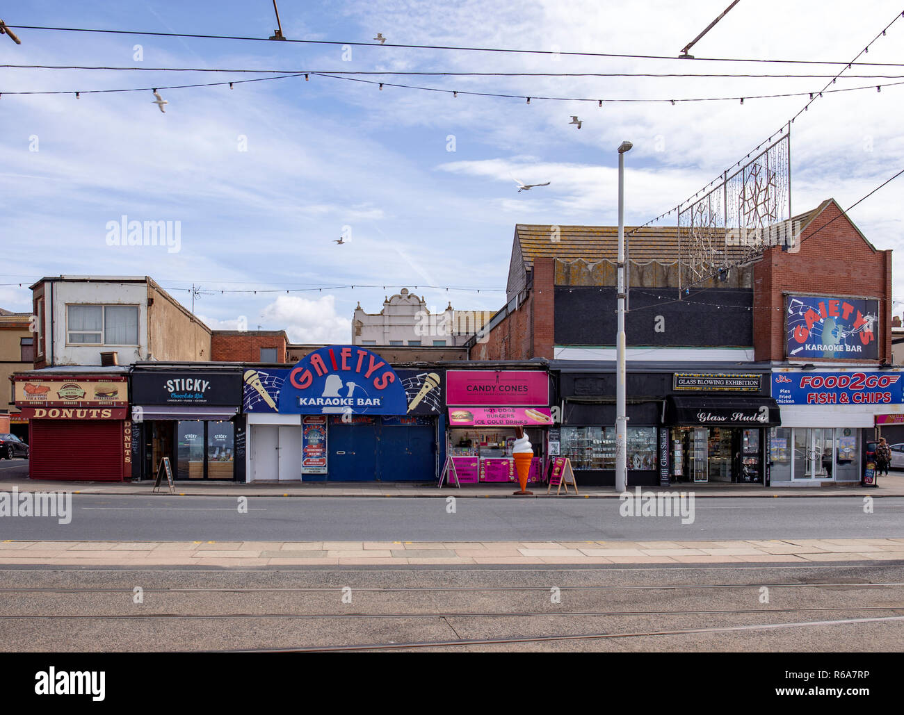 Traditional shops on the seafront promenade in Blackpool Lancashire UK ...