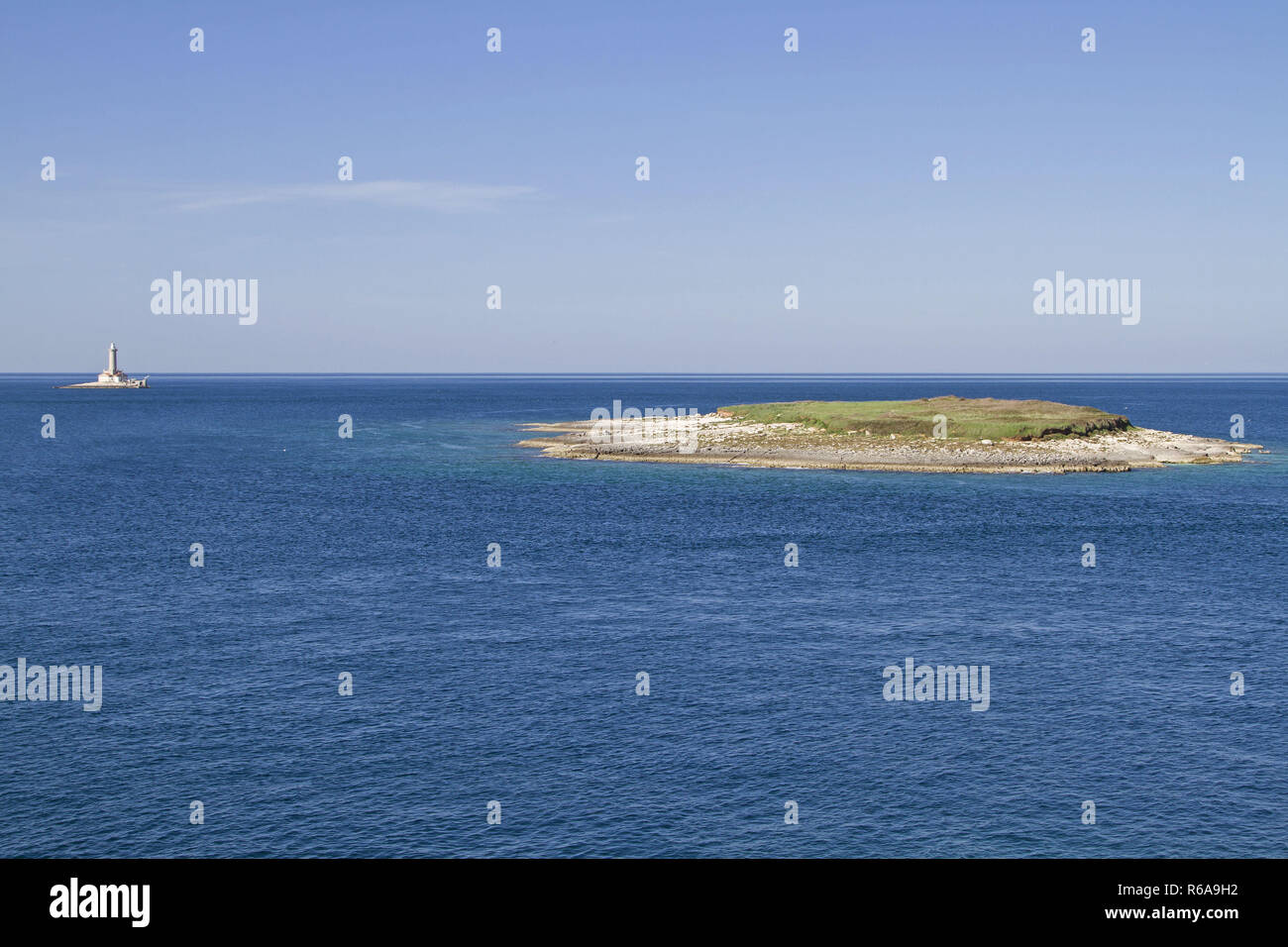 Lighthouse Porer On A Small Rocky Island Off The Lonely Southern Tip Of ...