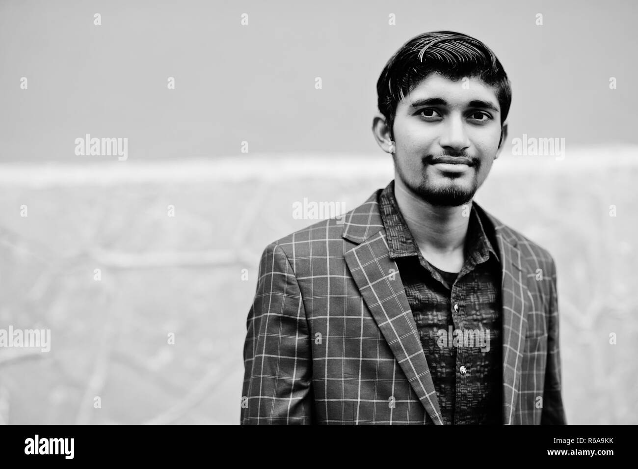 Young indian man on suit posed outdoor Stock Photo - Alamy