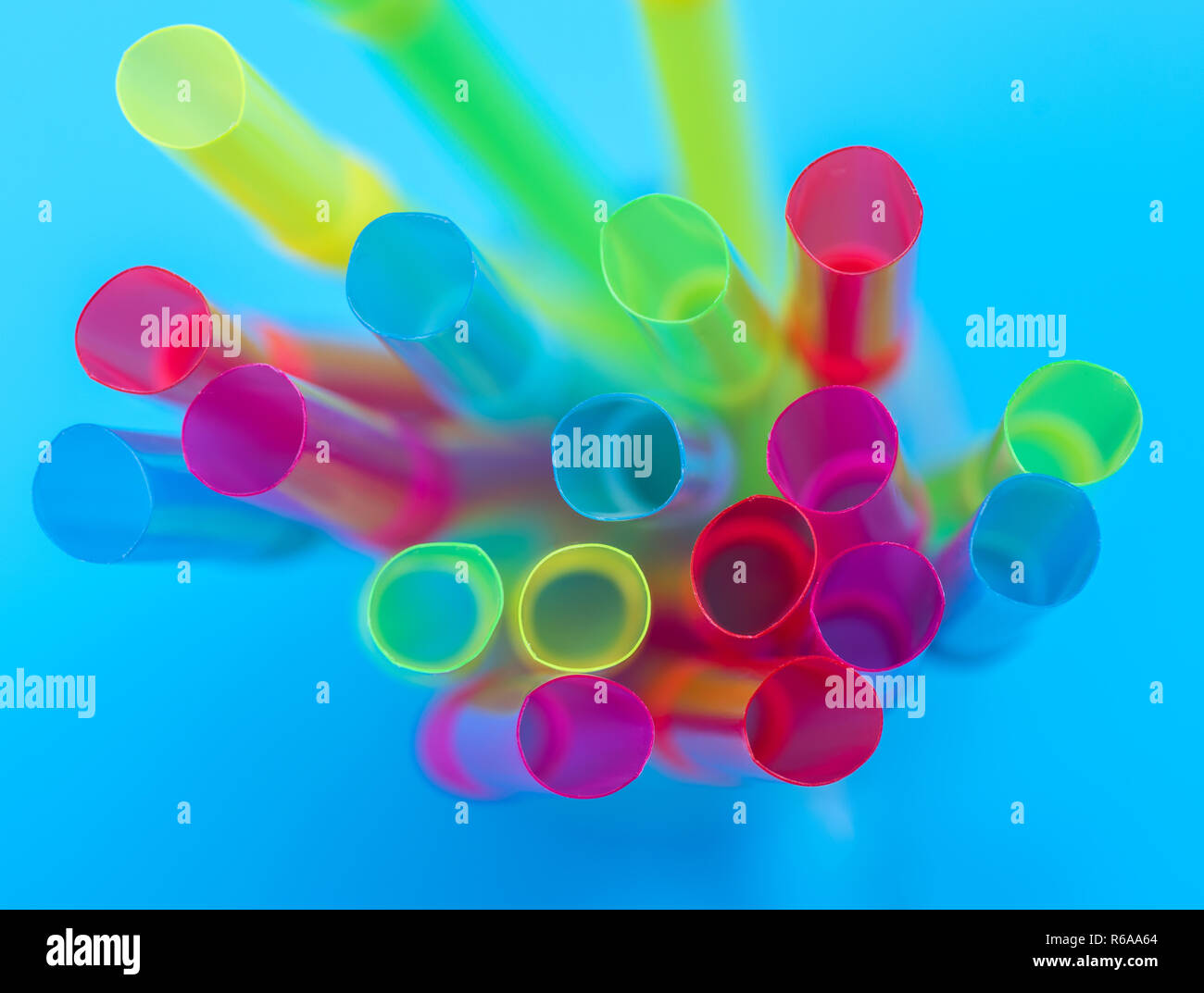 multi-colored plastic tubes for a cocktail Stock Photo - Alamy
