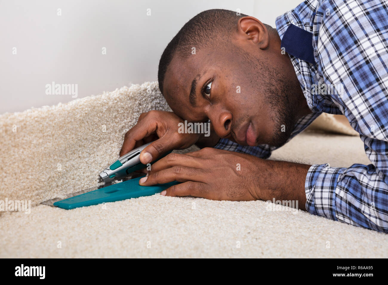 Craftsman Fitting Carpet Stock Photo - Alamy