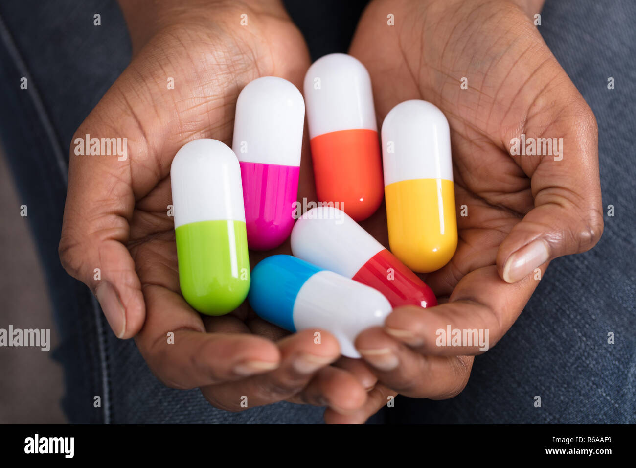 Human Hand With Variety Of Medicine Pills Stock Photo - Alamy