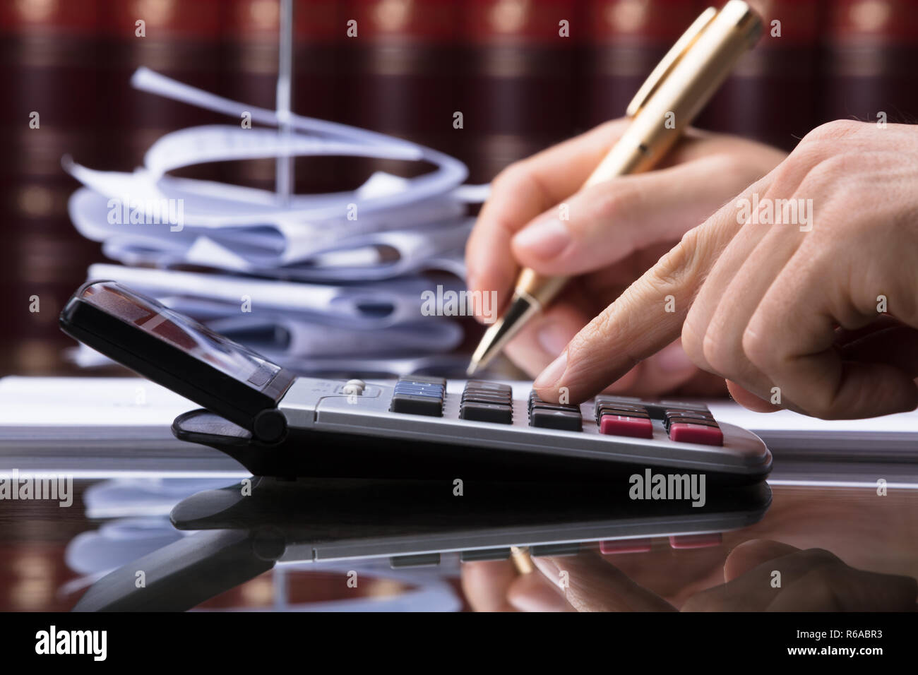 Human Hand Calculating Bill Stock Photo - Alamy