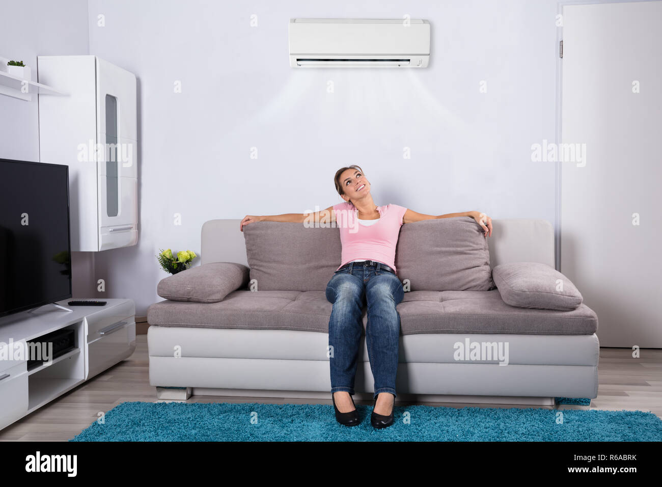 Woman radiator relaxing hi-res stock photography and images - Alamy