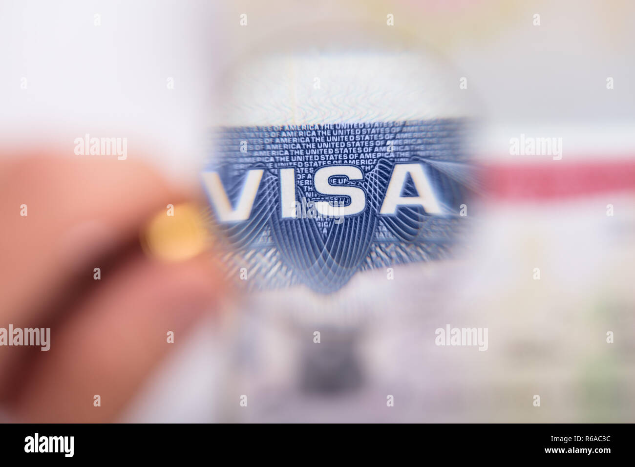 Human Hand Zooming At Visa Text Stock Photo - Alamy