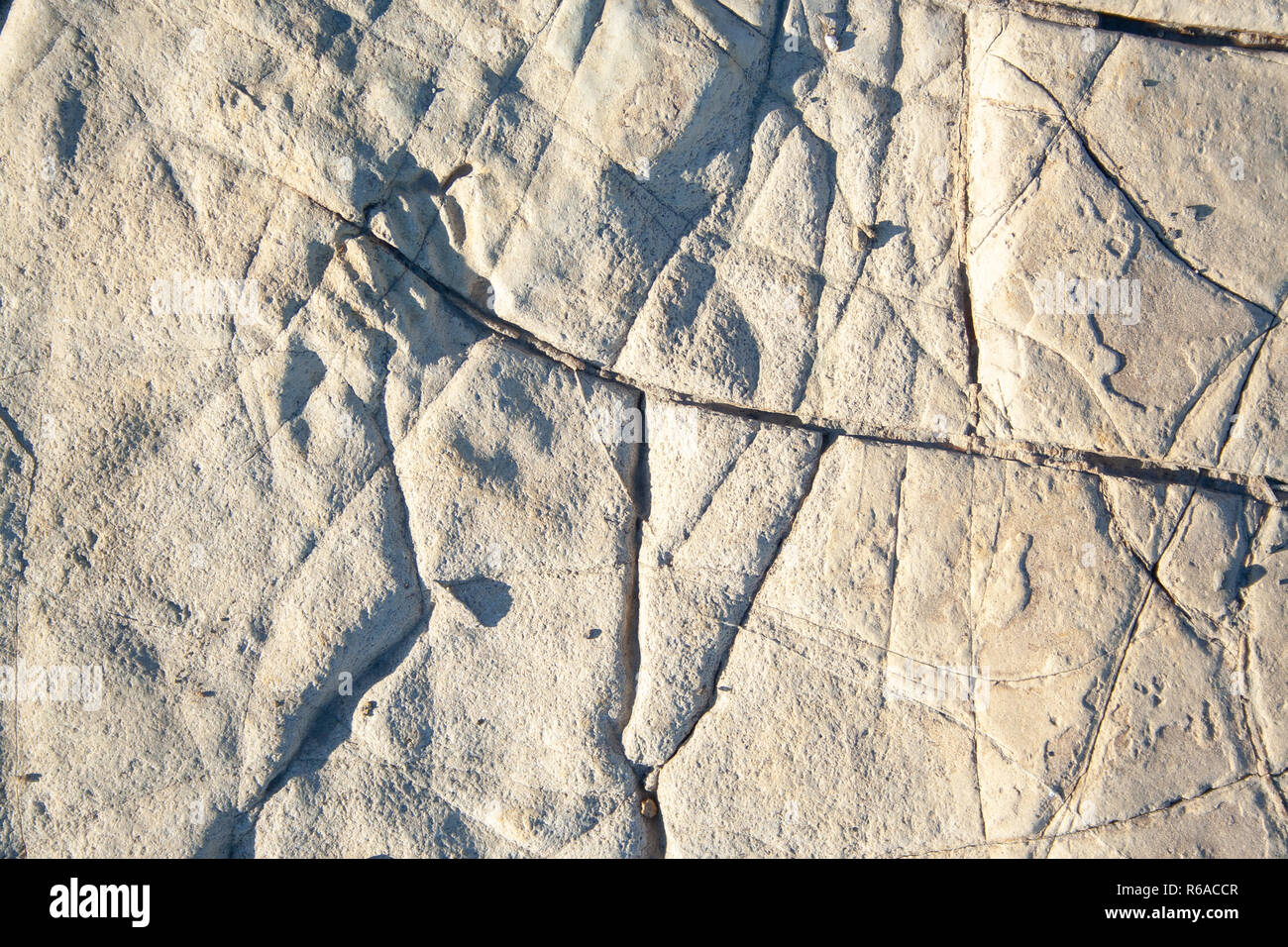 Stone texture close-up. Old aged stone surface on sun background Stock ...