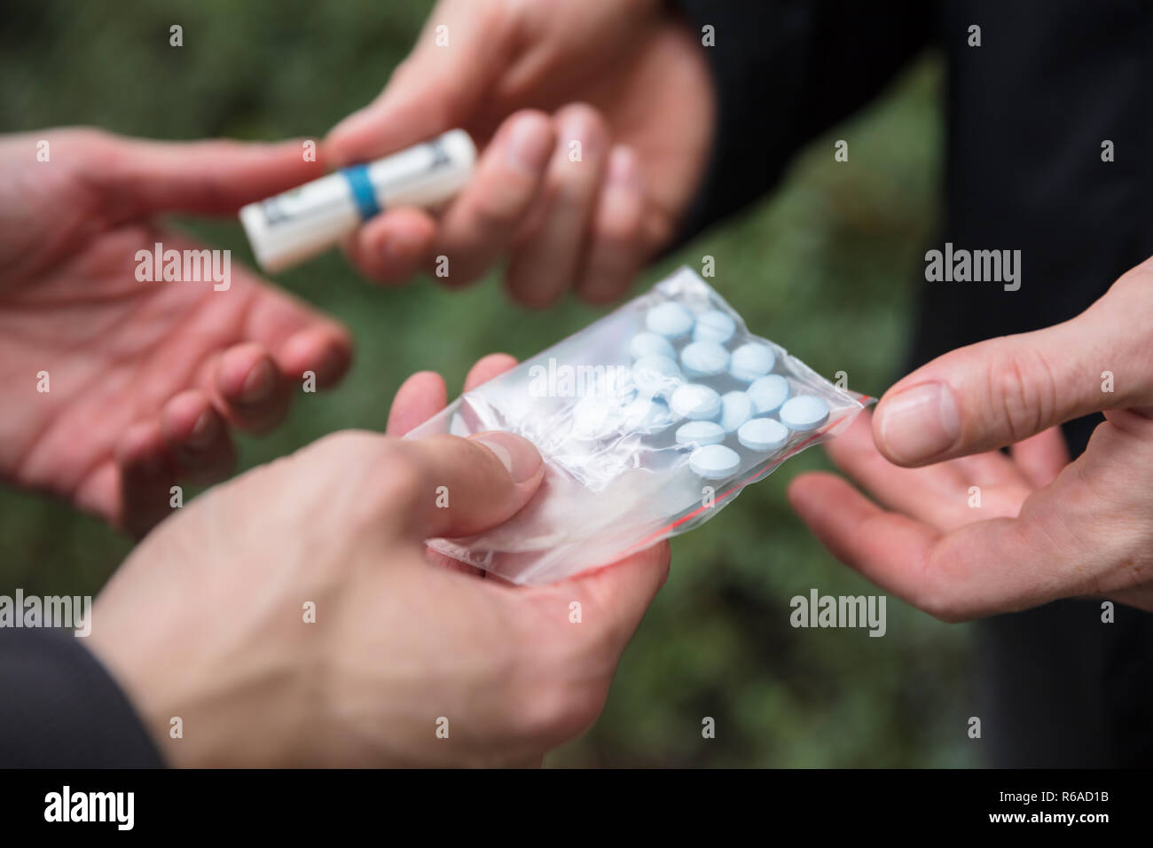 Person Buying Drugs In Exchange Of Money Stock Photo - Alamy
