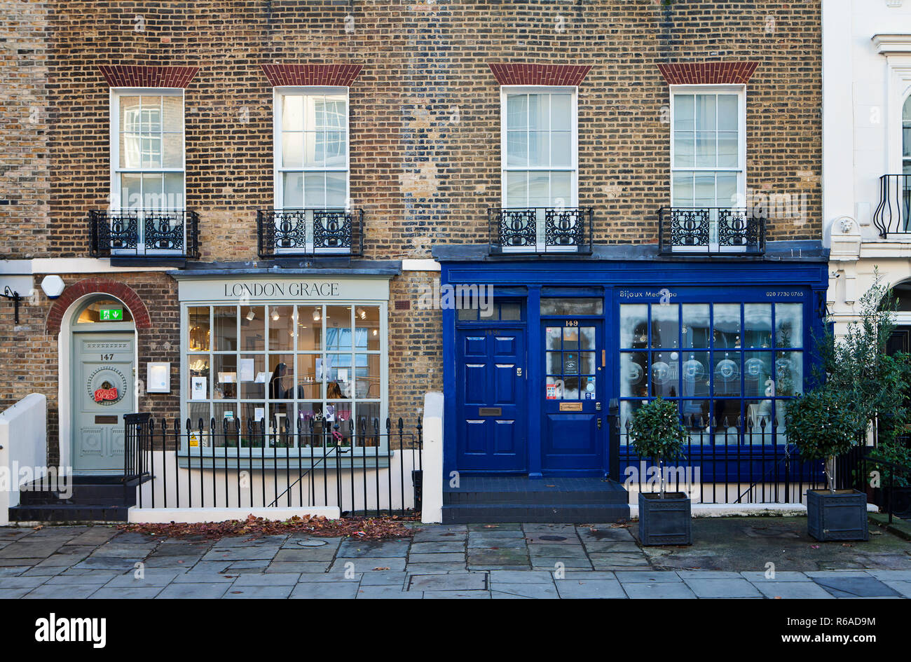 LONDON, UNITED KINGDOM - NOVEMBER 30th, 2018: Traditional store fronts ...