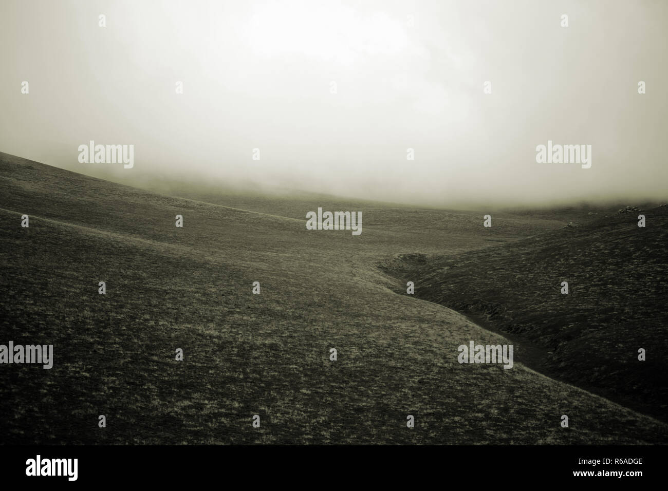 Fog On The Prairie Hills Stock Photo - Alamy
