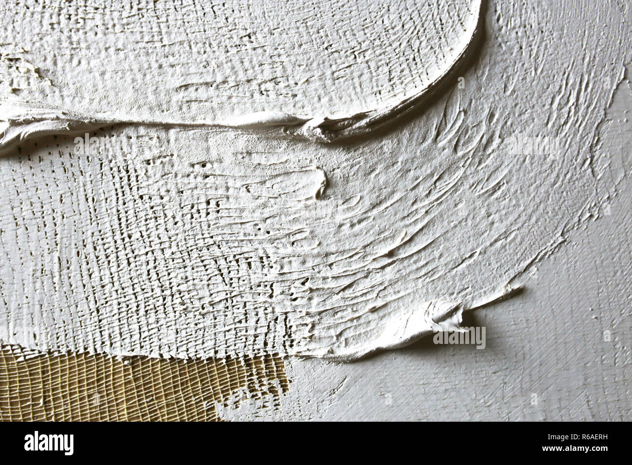 a wash of white primer of the canvas. texture for artists Stock Photo ...